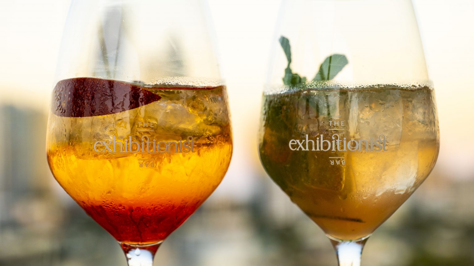 About - The Exhibitionist Bar